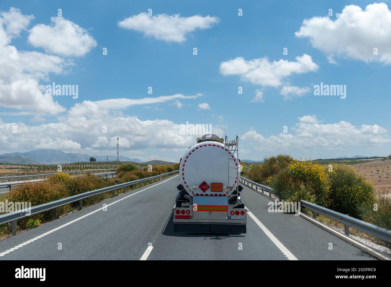 Tank truck with dangerous goods, danger from flammable liquids, driving ...