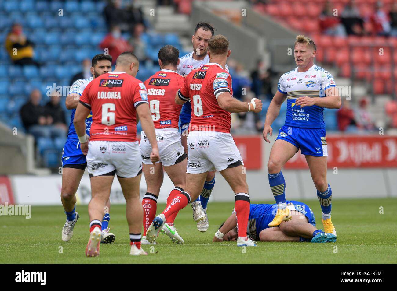 Bodene Thompson (20) of Leeds Rhinos and Lee Mossop (8) of Salford Red ...