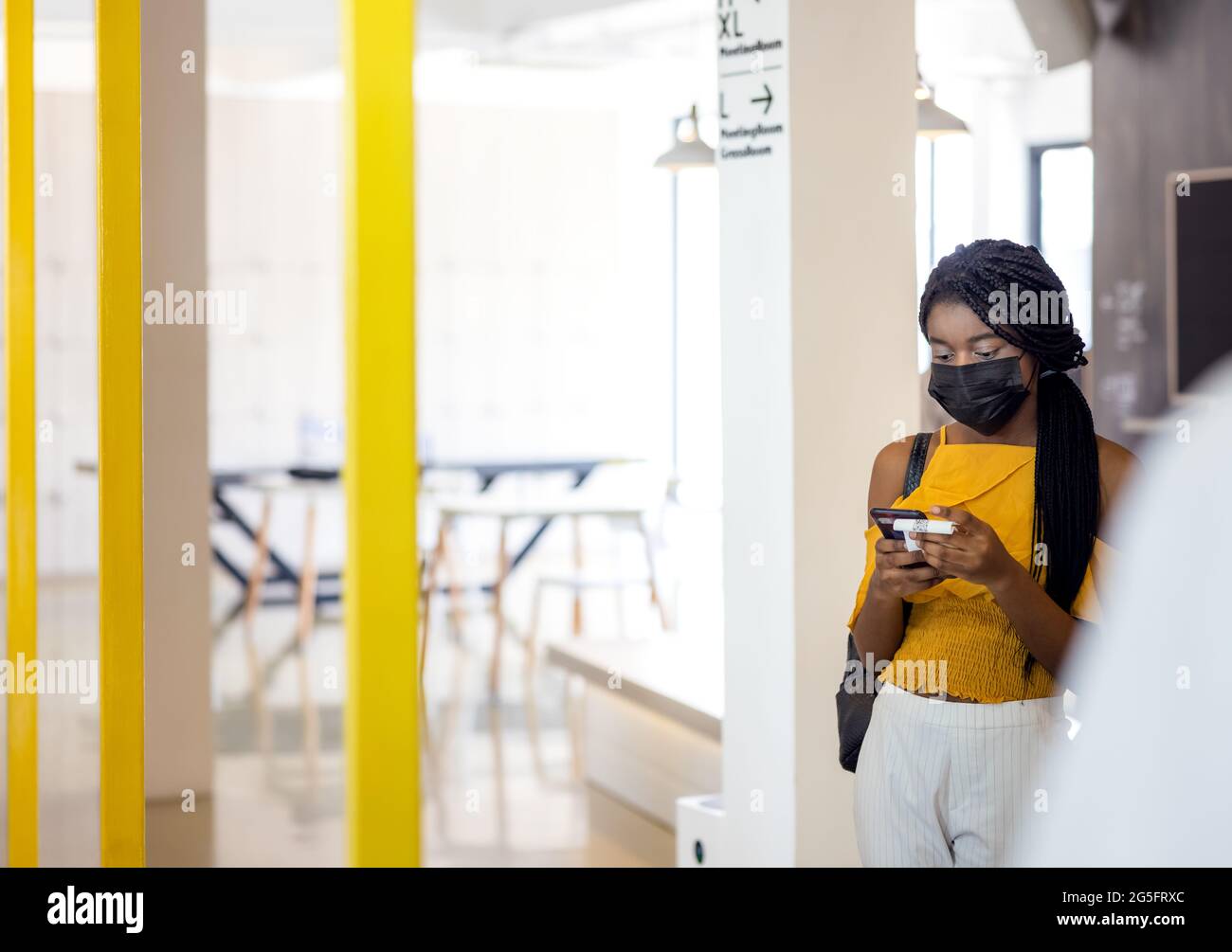 African school girl using phone hi-res stock photography and images - Alamy