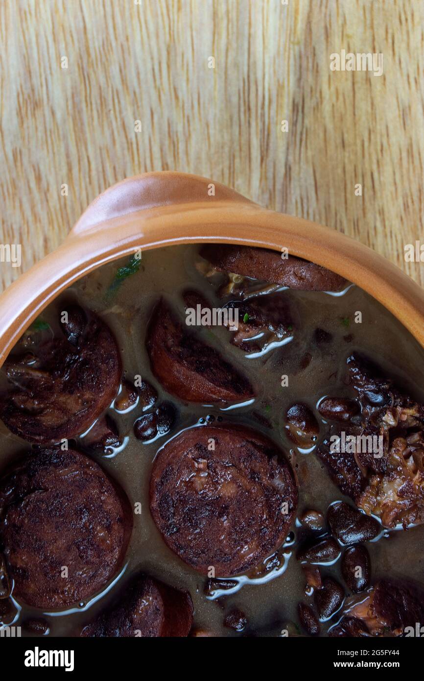 feijoada complete with various tasty ingredients, typical Brazilian ...