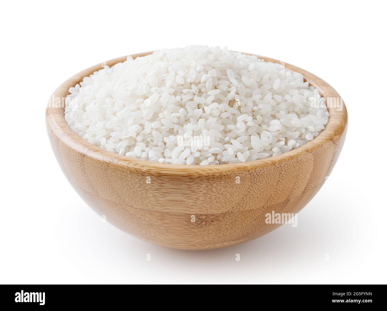 Uncooked round rice in wooden bowl isolated on white background with ...