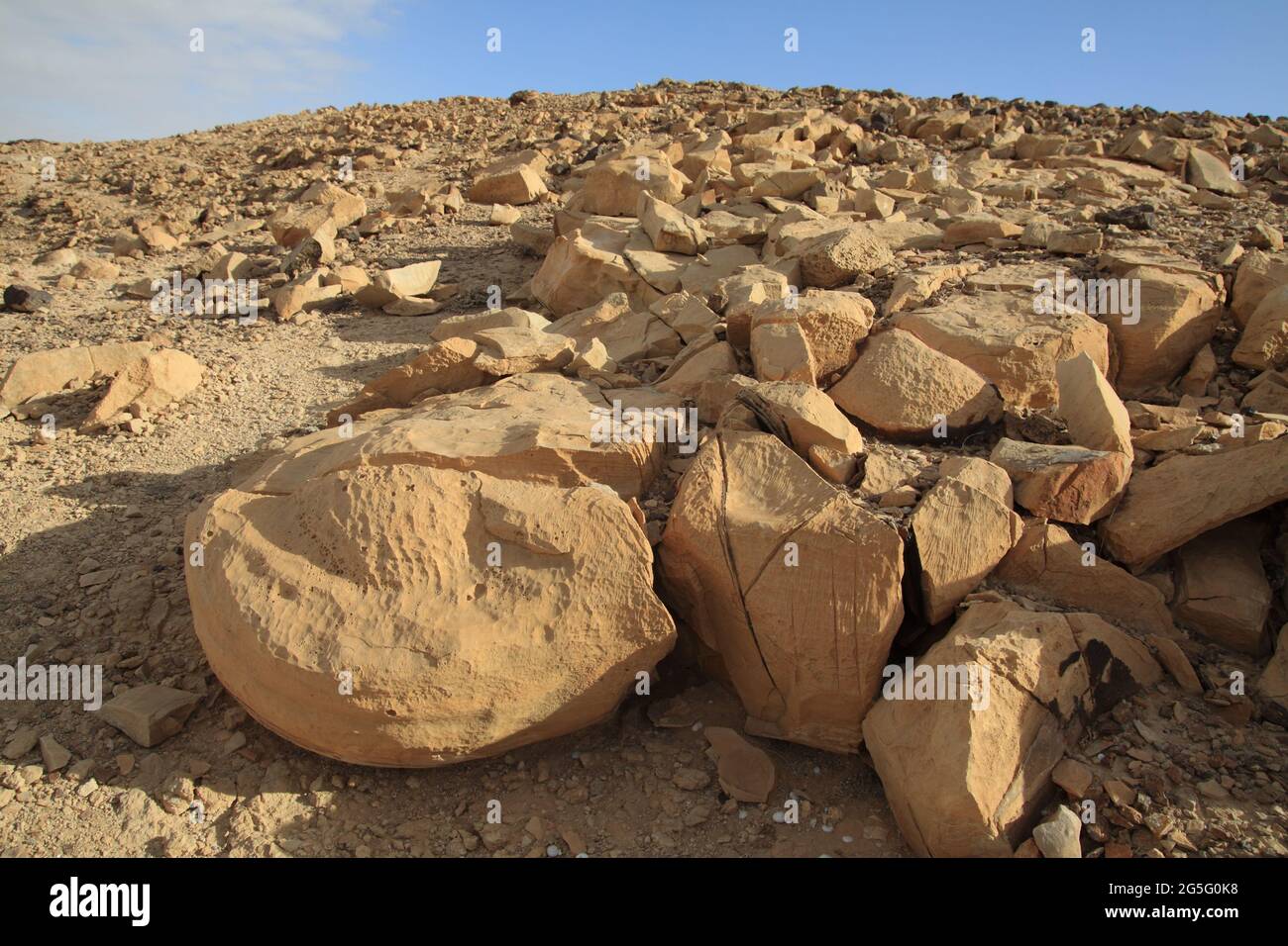 Large and small Limestone and flint Stone rocks lying on the slopes of ...
