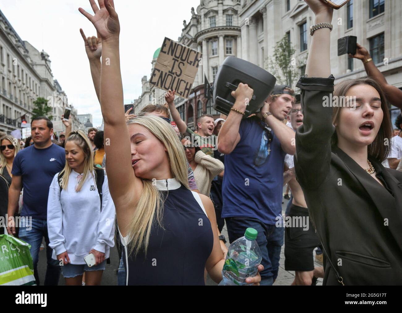 Protesters gesturing along Regents Street during the Freedom March ...