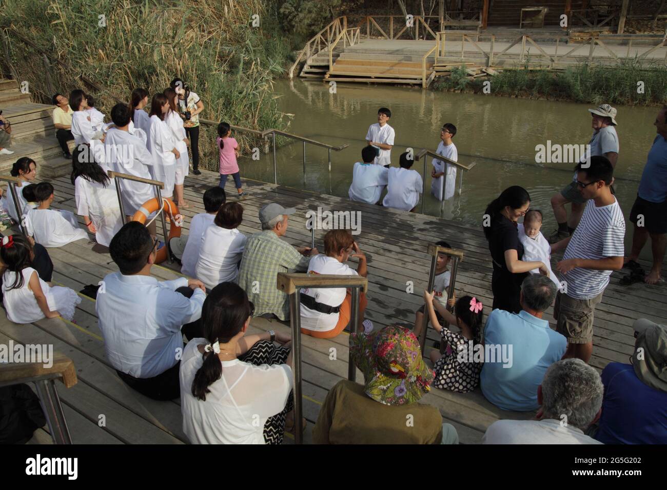 Korean Protestant pastor reads from the Bible.to his Korean Community ...
