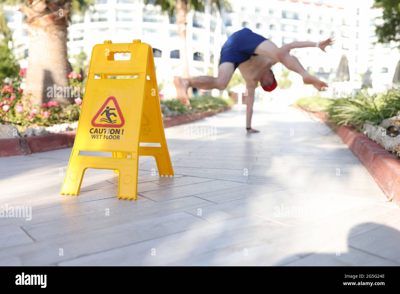 Man falling wet floor hi-res stock photography and images - Alamy