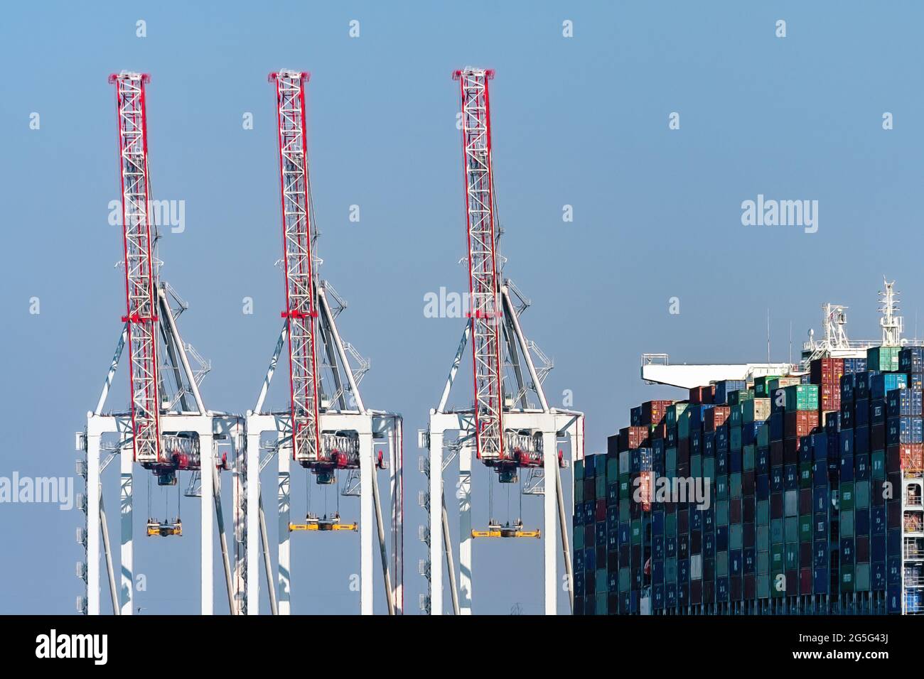 Abstract view of dockside cranes with a container ship - July 2018 ...