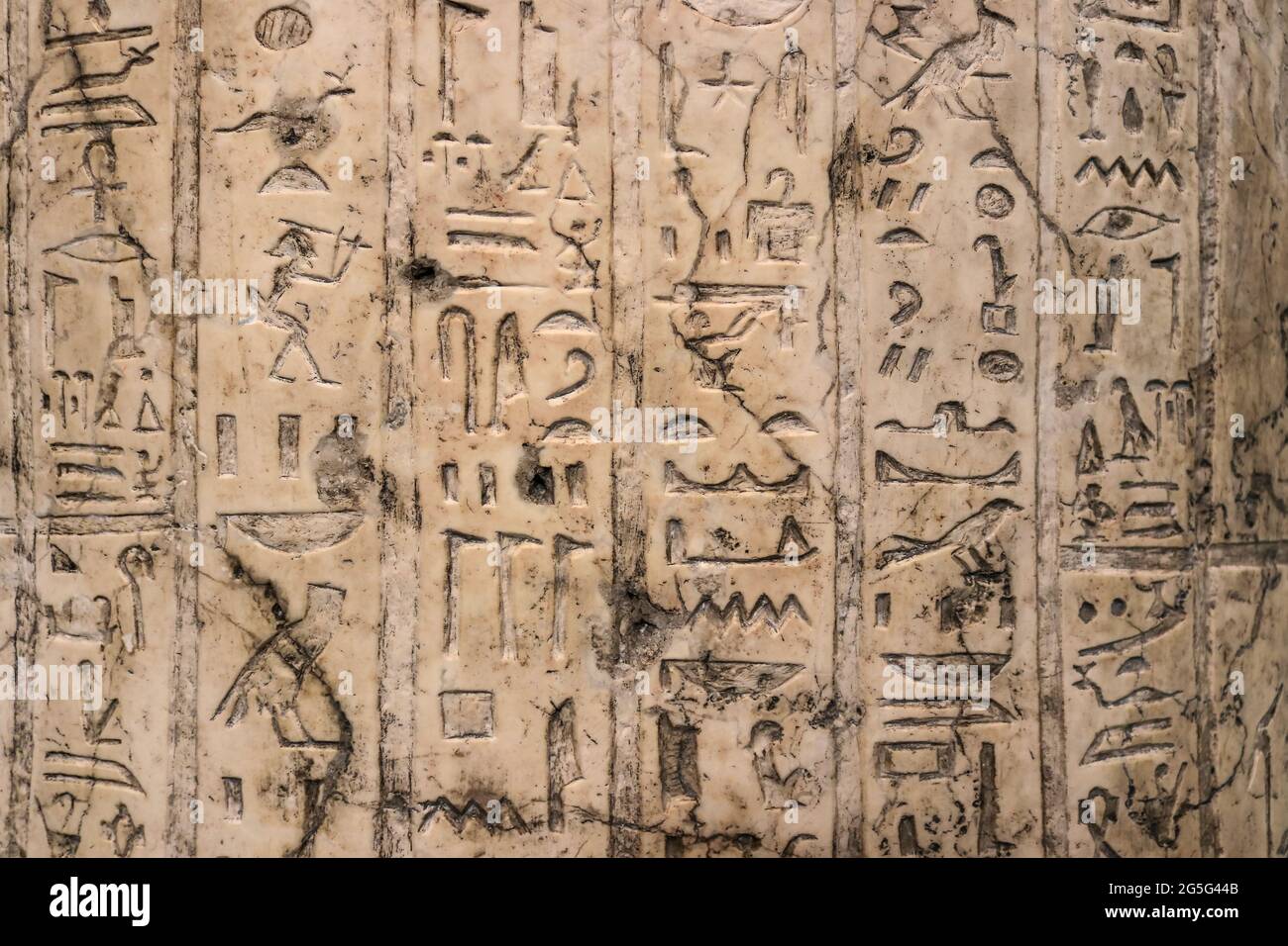 Ancient Egyptian hieroglyphs in column carved in marble - close-up with ...