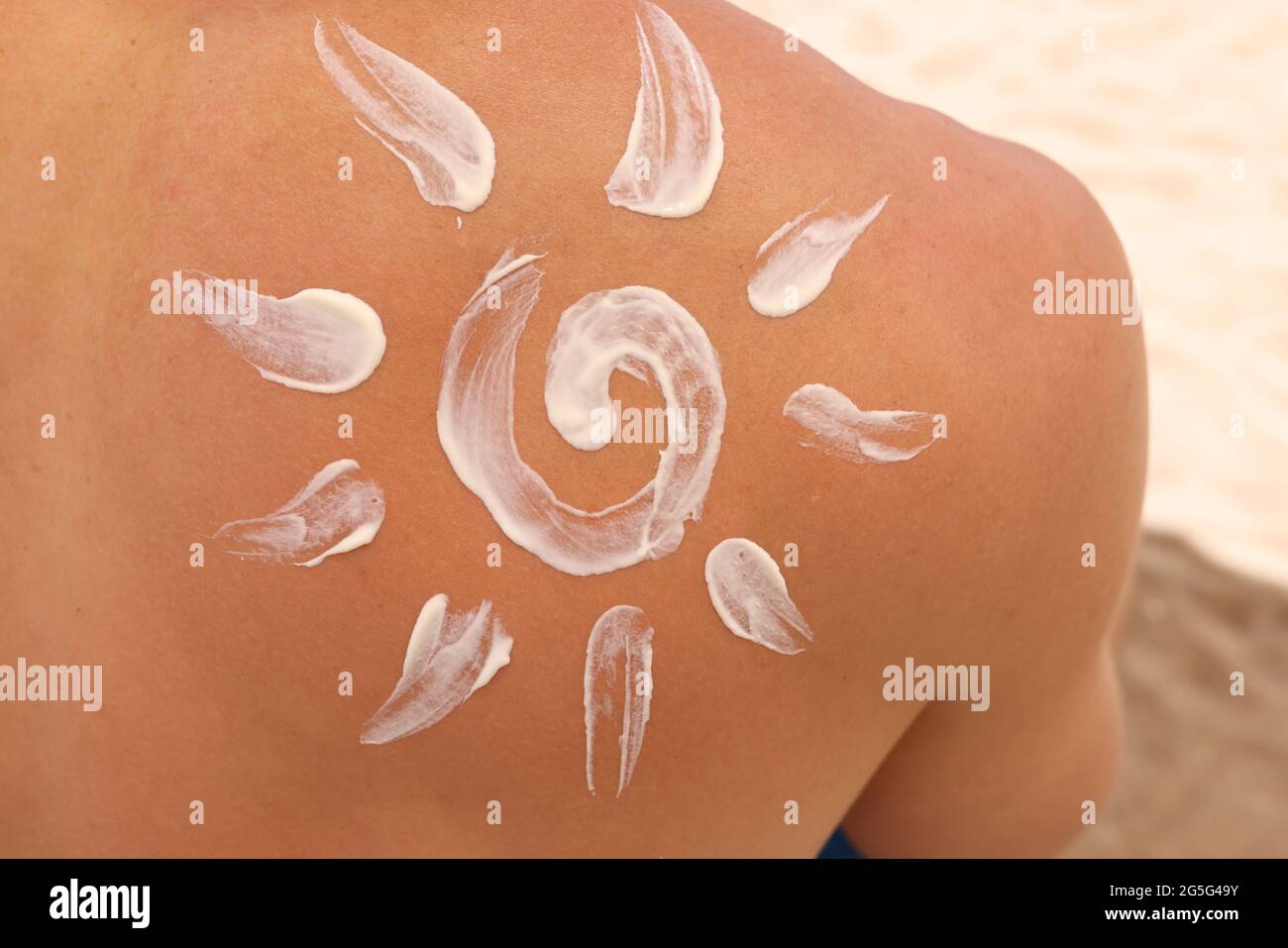 Apply sunscreen hi-res stock photography and images - Alamy