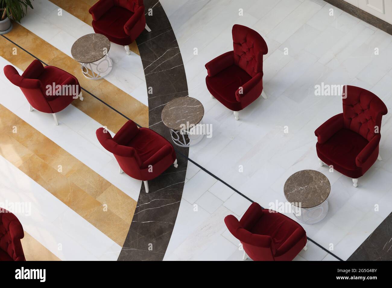 Red chairs and small tables standing in large hall top view Stock Photo ...