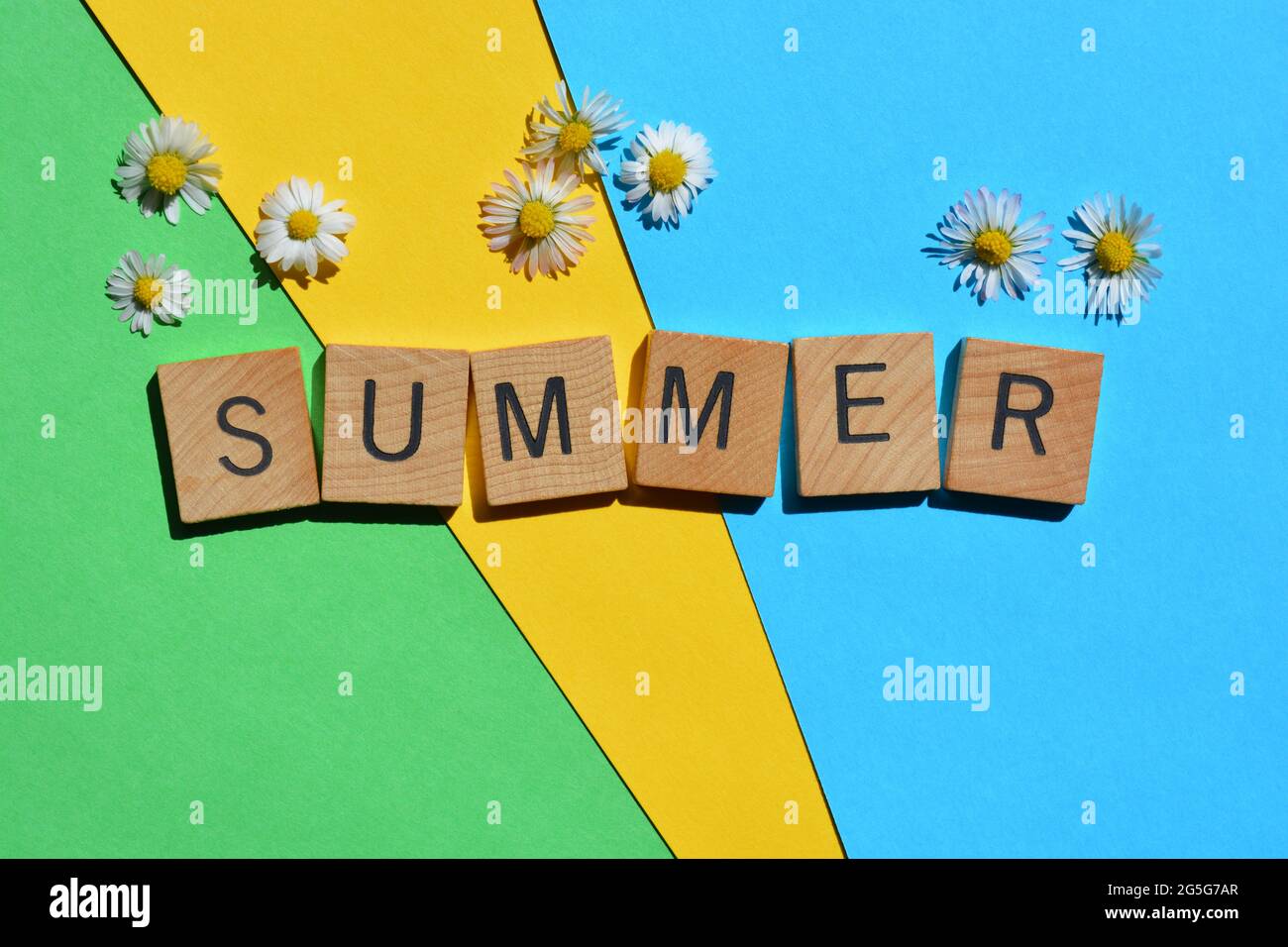 Summer, word in wooden alphabet letters isolated on bright yellow ...