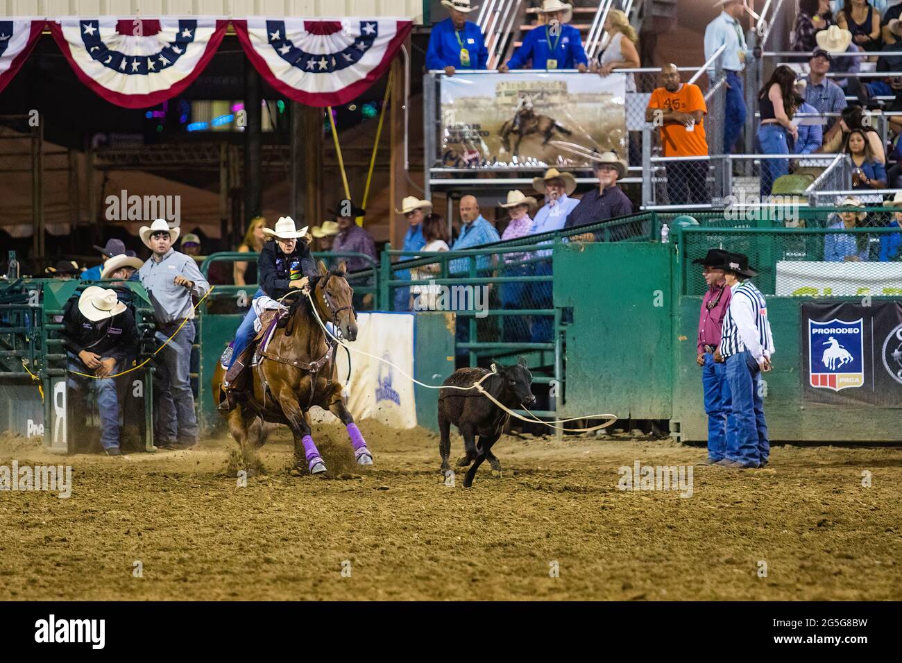 Reno, United States. 26th June, 2021. JJ Hampton ropes a calf becoming ...