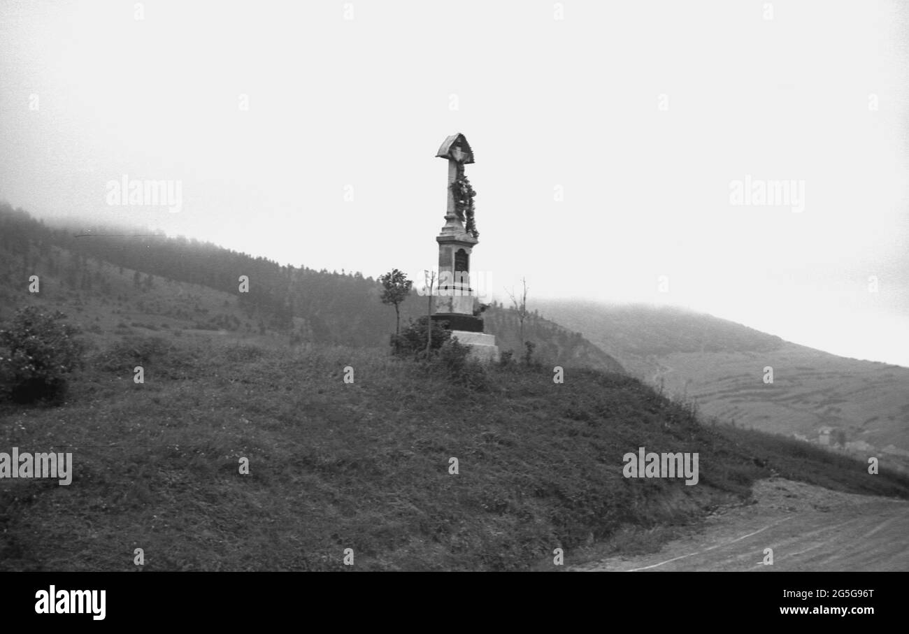 mid-1930s, historical, a flower braid on a wayside shrine or religious ...