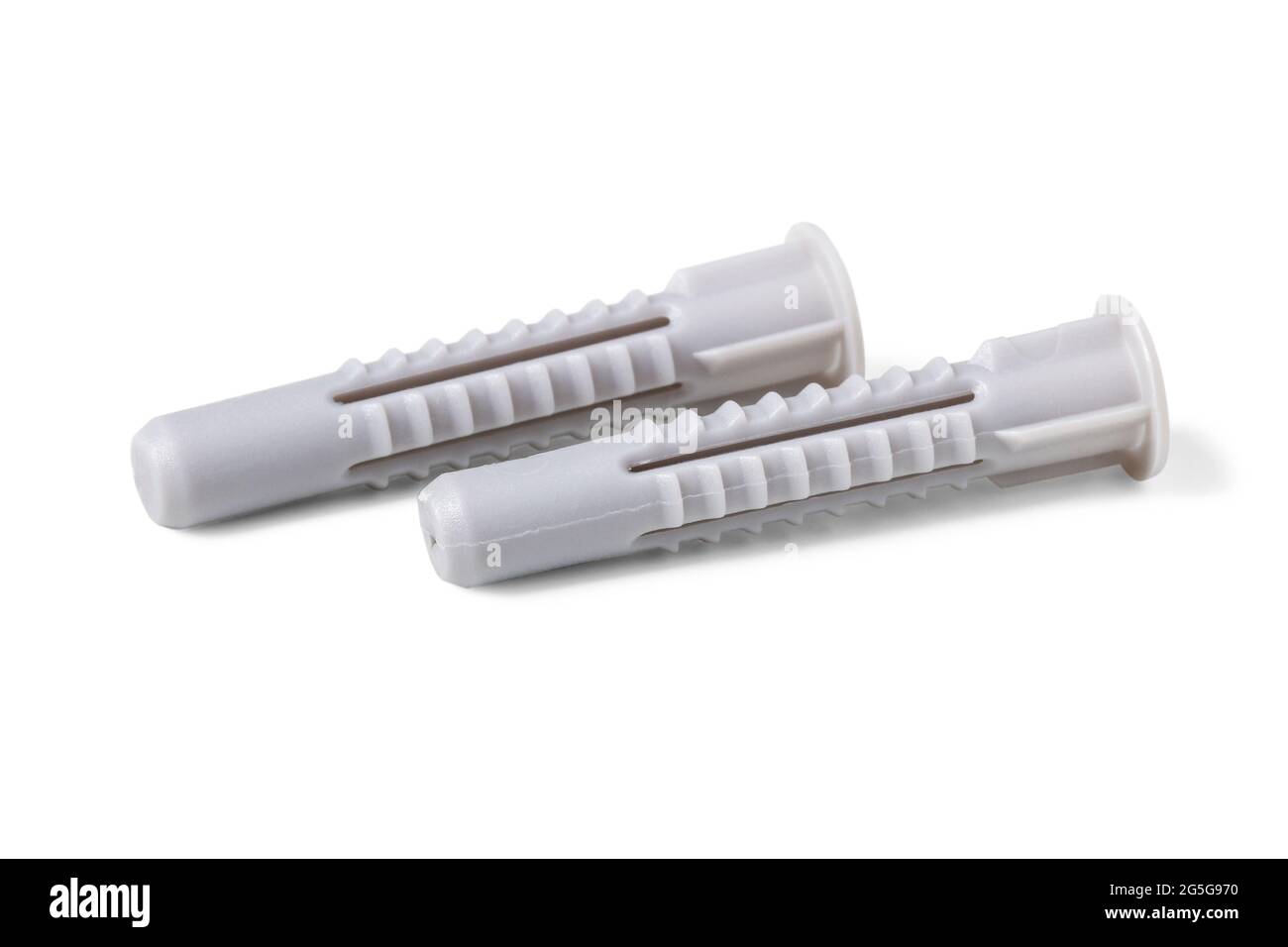 Plastic dowels close up isolated on white background Stock Photo - Alamy