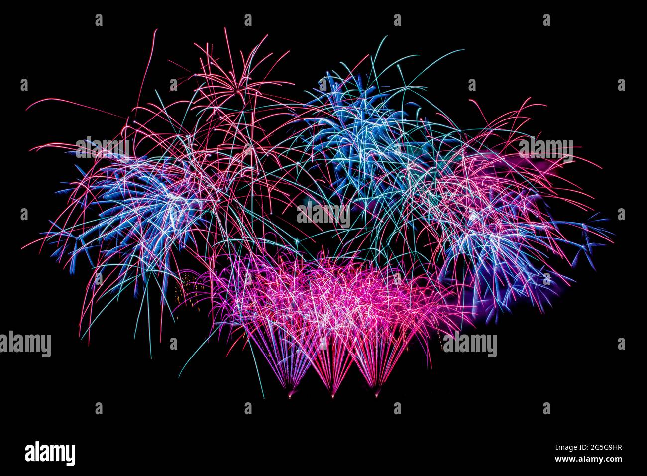 Colorful fireworks isolated on a black background Stock Photo - Alamy