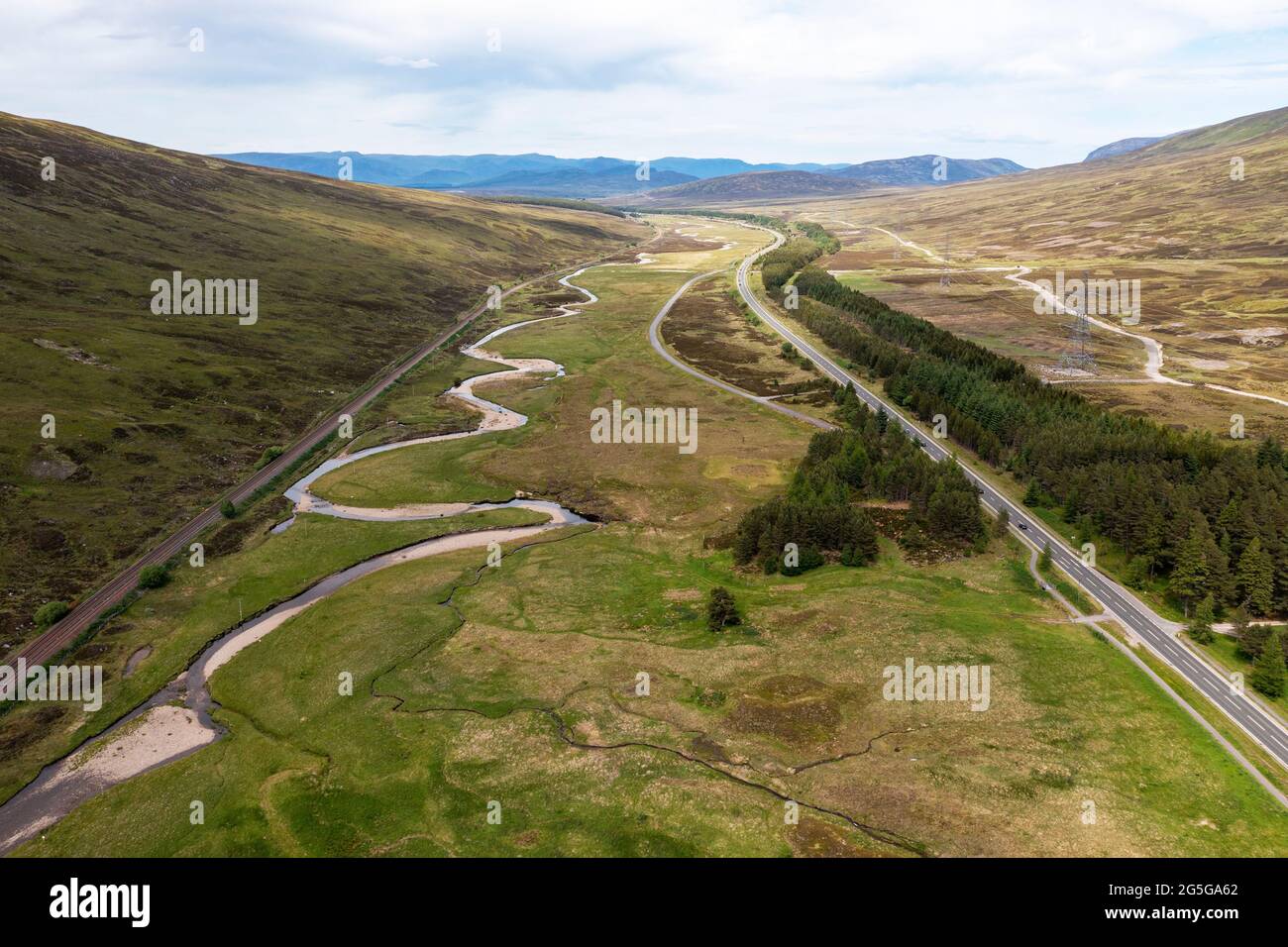 Aerial view of the A9 trunk road and main highland railway line at the ...