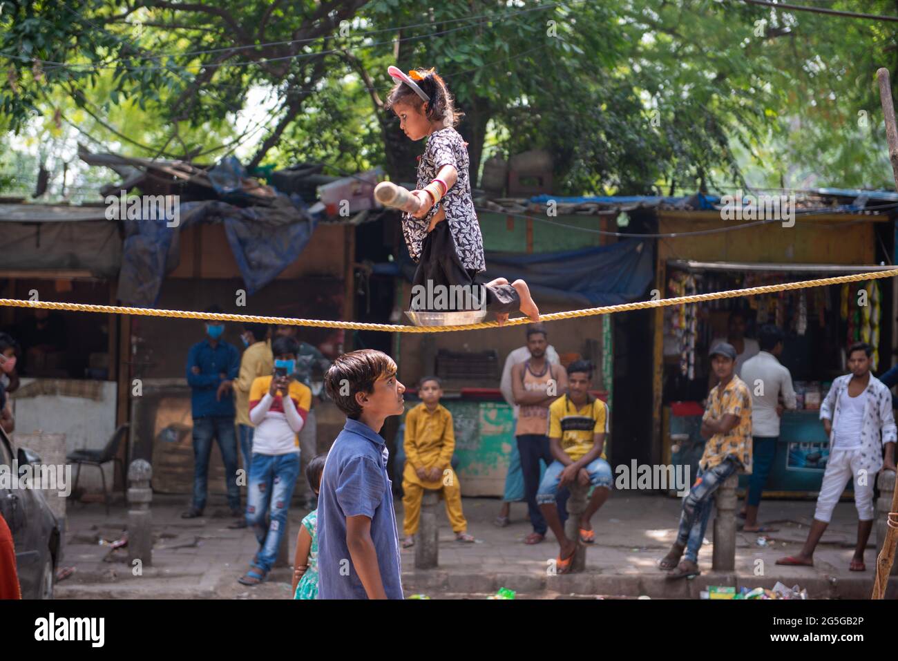 New Delhi, India. 27th June, 2021. An unidentified Indian girl does ...
