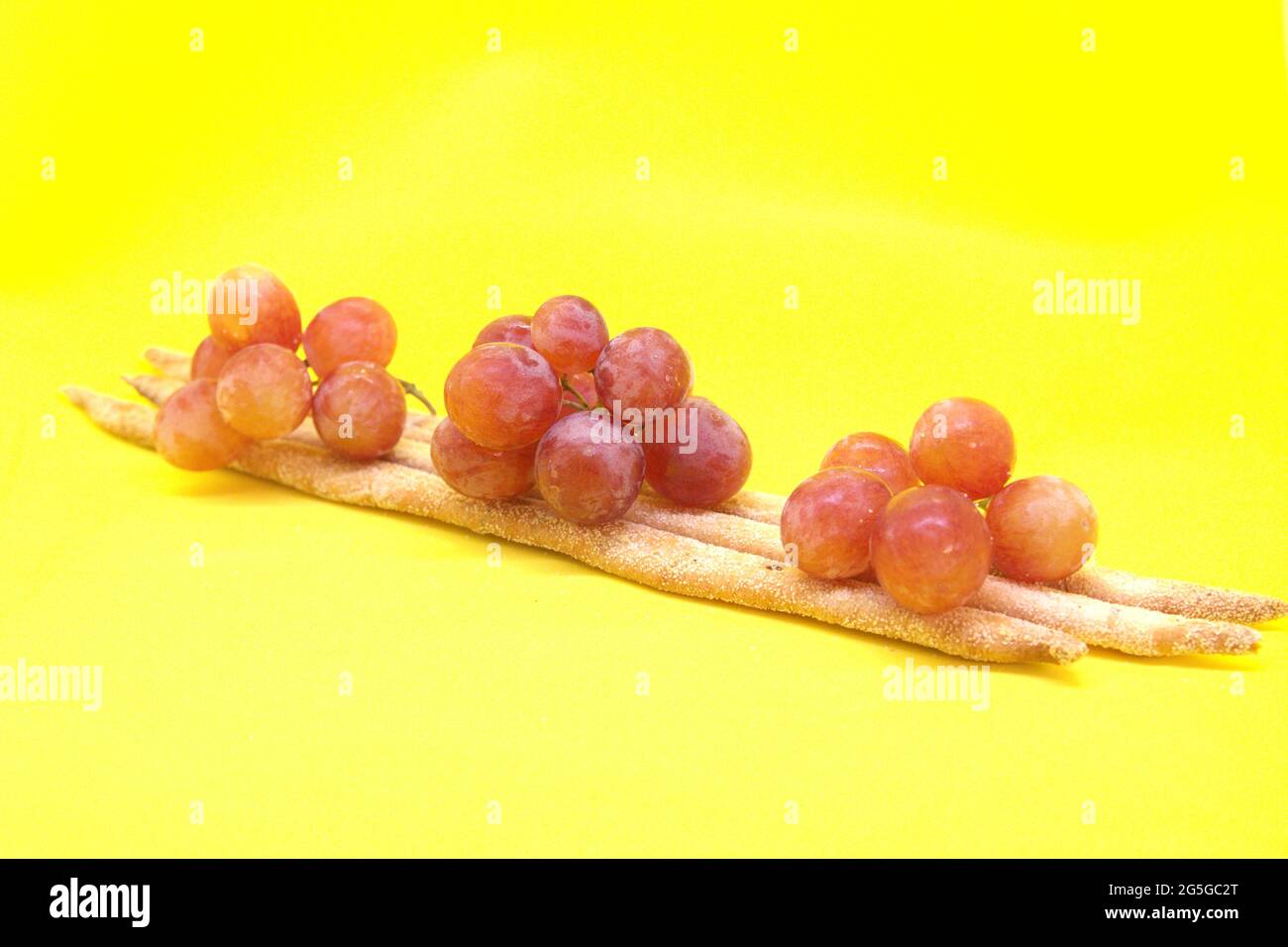 healthy snack red grapes on grissini Stock Photo - Alamy