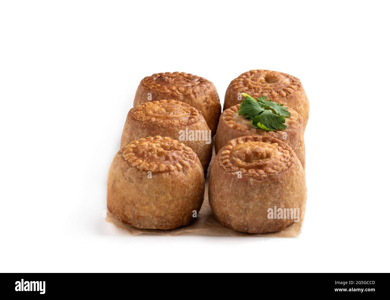 Mini Melton Mowbray pork pies isolated on white background Stock Photo ...