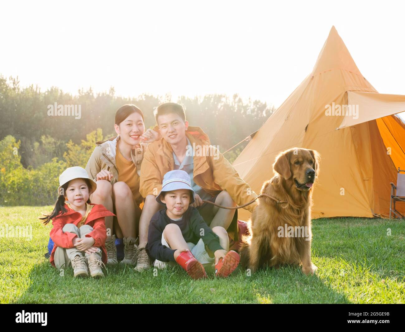 Happy family of four and pet dog in outdoor photo high quality photo ...