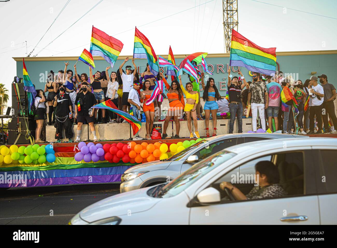 HERMOSILLO, MEXICO - JUNE 26:people in allegorical car with ...