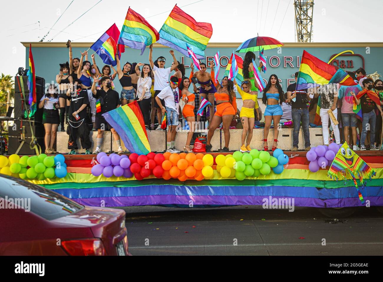 HERMOSILLO, MEXICO - JUNE 26:people in allegorical car with ...