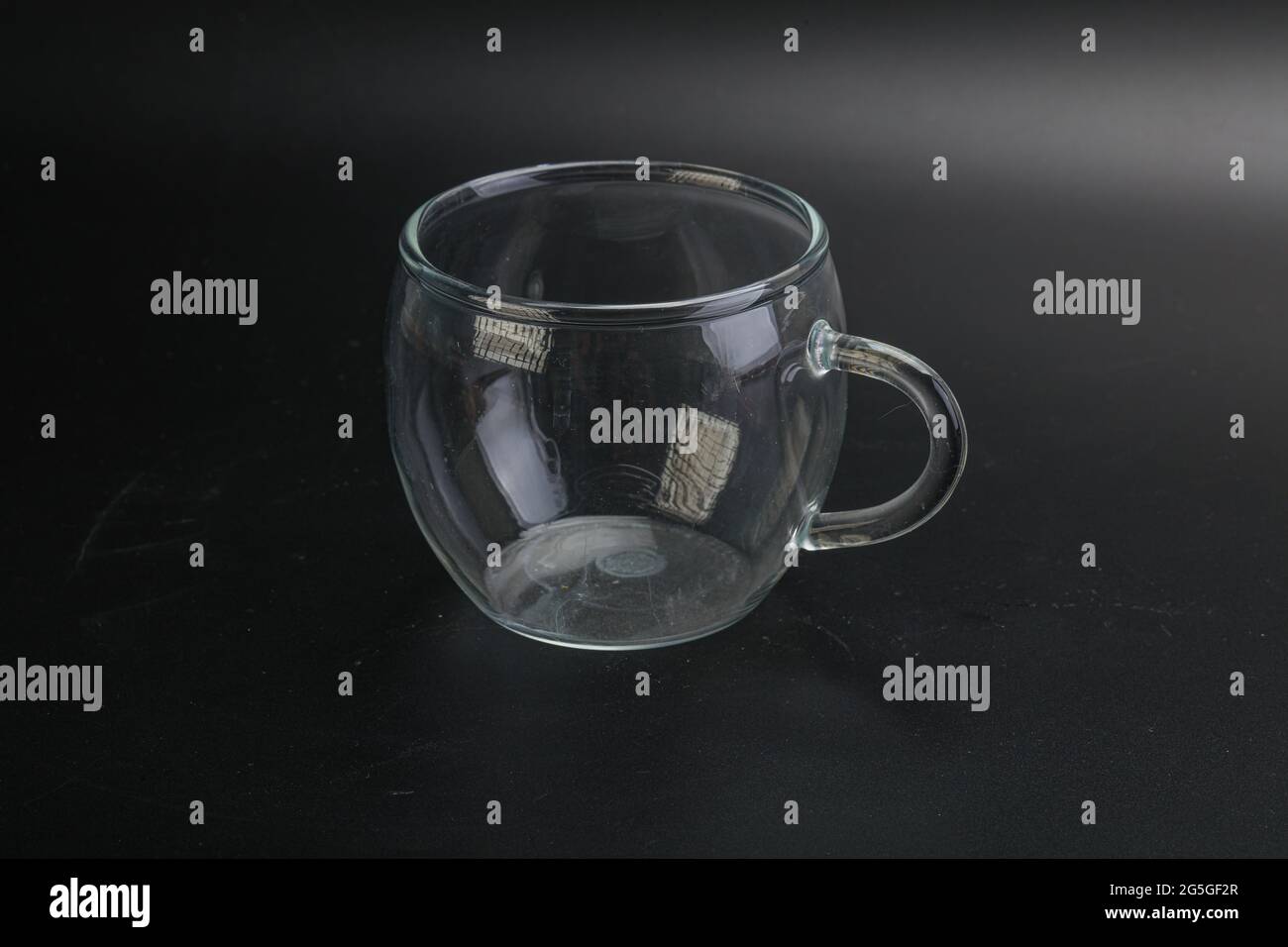 Empty glass cup for drinks isolated Stock Photo - Alamy
