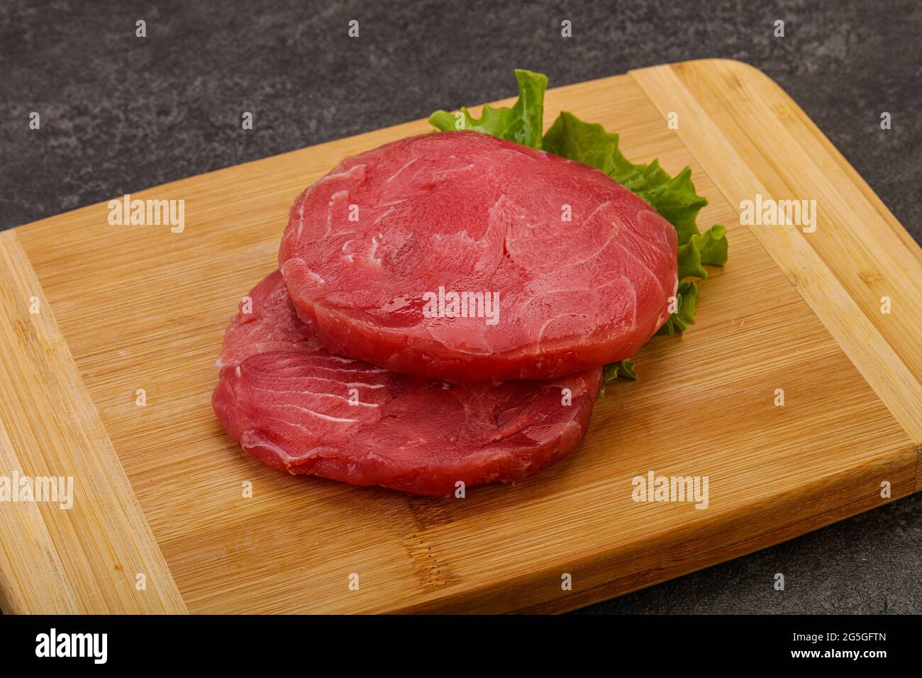 Raw tuna fish steak for grill Stock Photo - Alamy