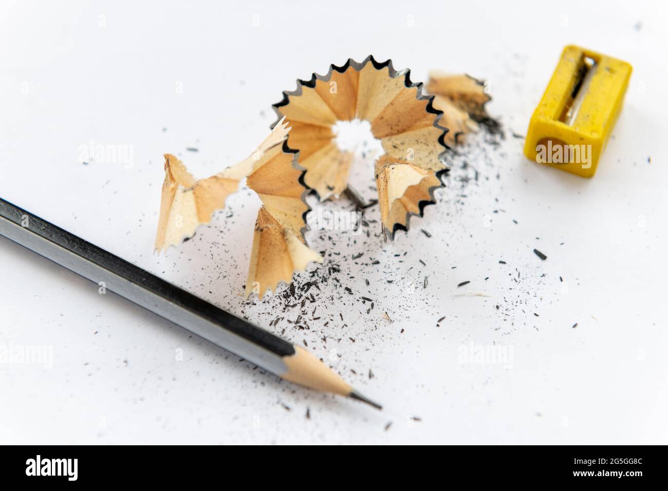 A sharpened pencil with shavings isolated with a white background Stock ...