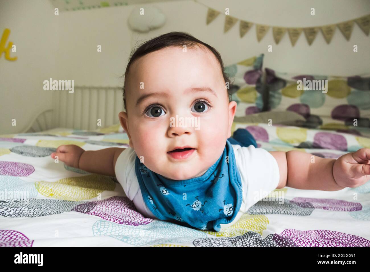 A portrait of adorable baby lying Stock Photo - Alamy