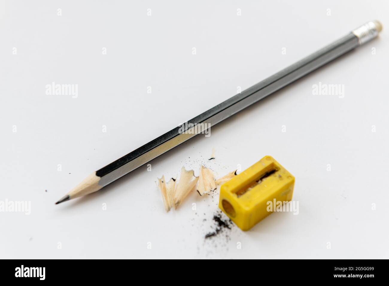 A sharpened pencil with shavings isolated with a white background Stock ...