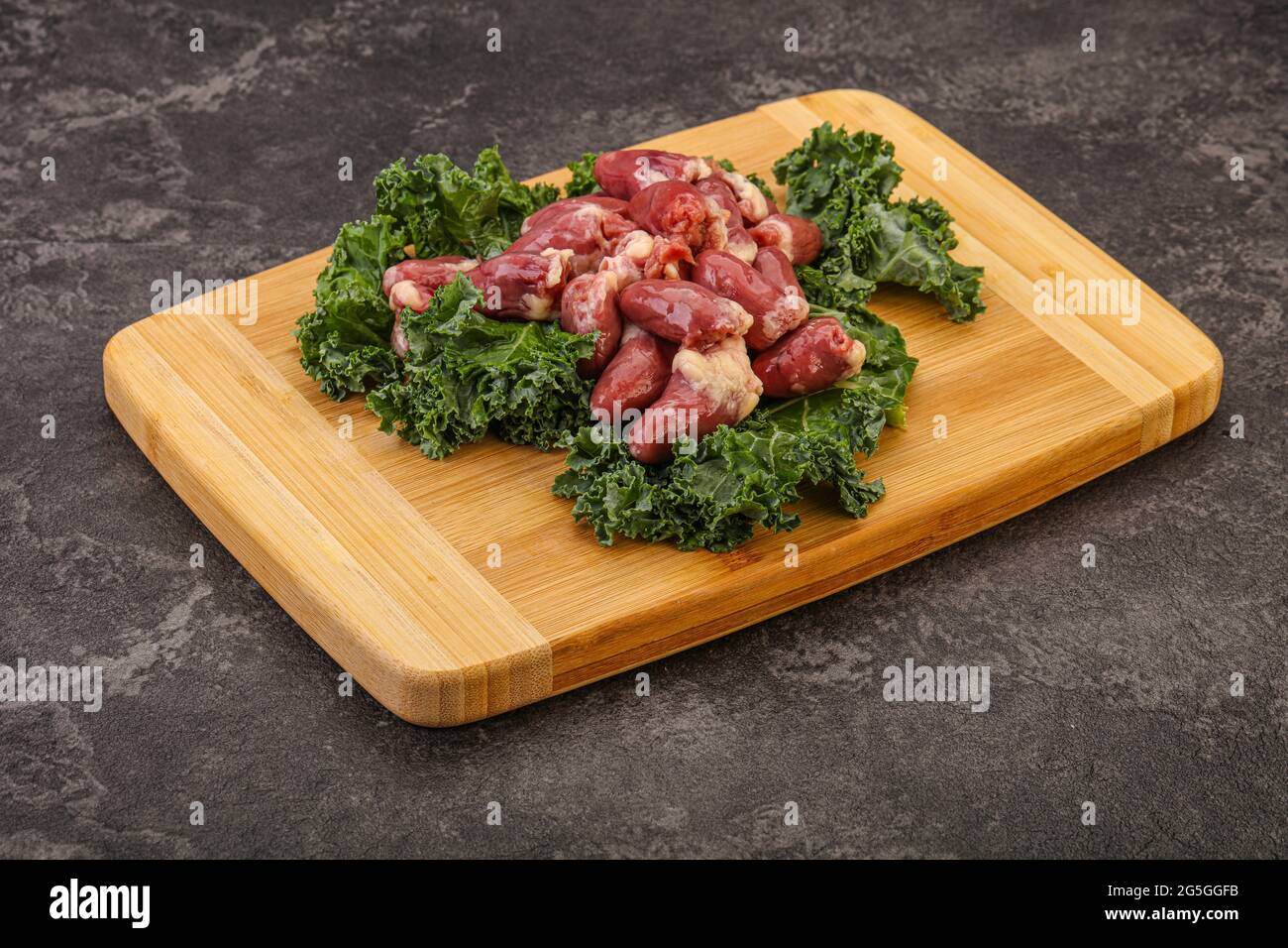 Raw chicken hearts heap for cooking Stock Photo - Alamy