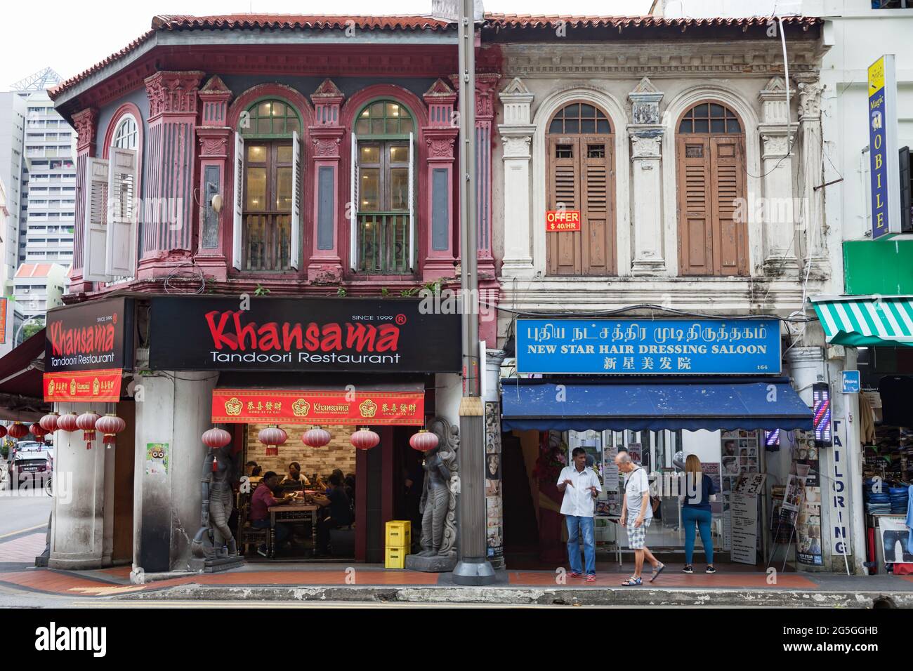 Traditional colonial buildings housing shops and restaurants in ...