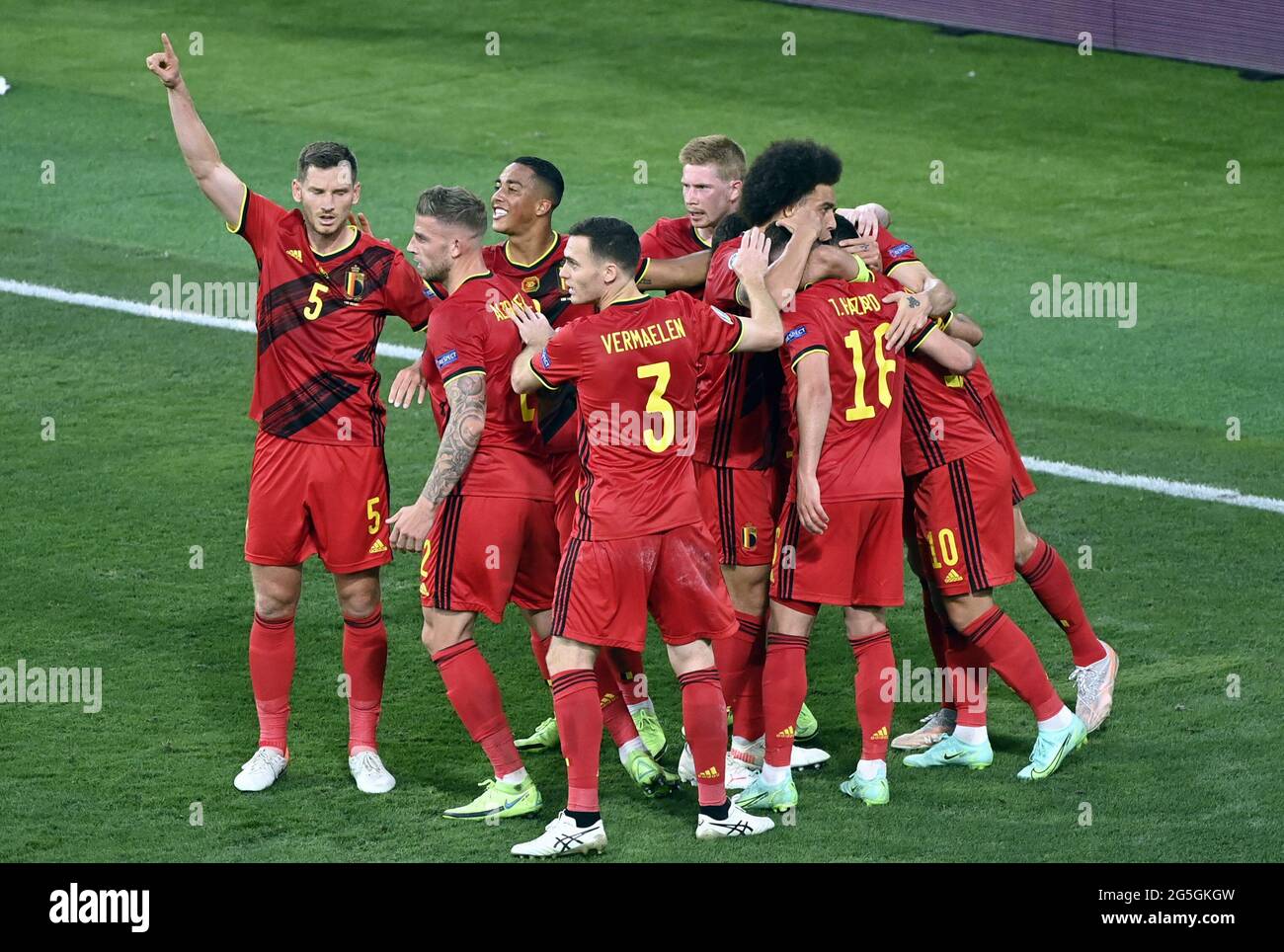 Belgium's players celebrate after scoring during the round of 16 game ...
