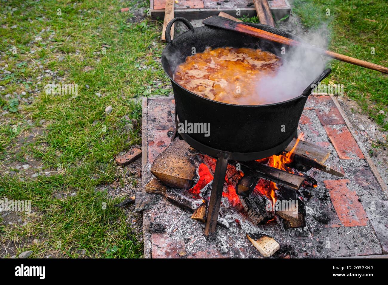 Romanian traditional food prepared at the cauldron on the open fire ...