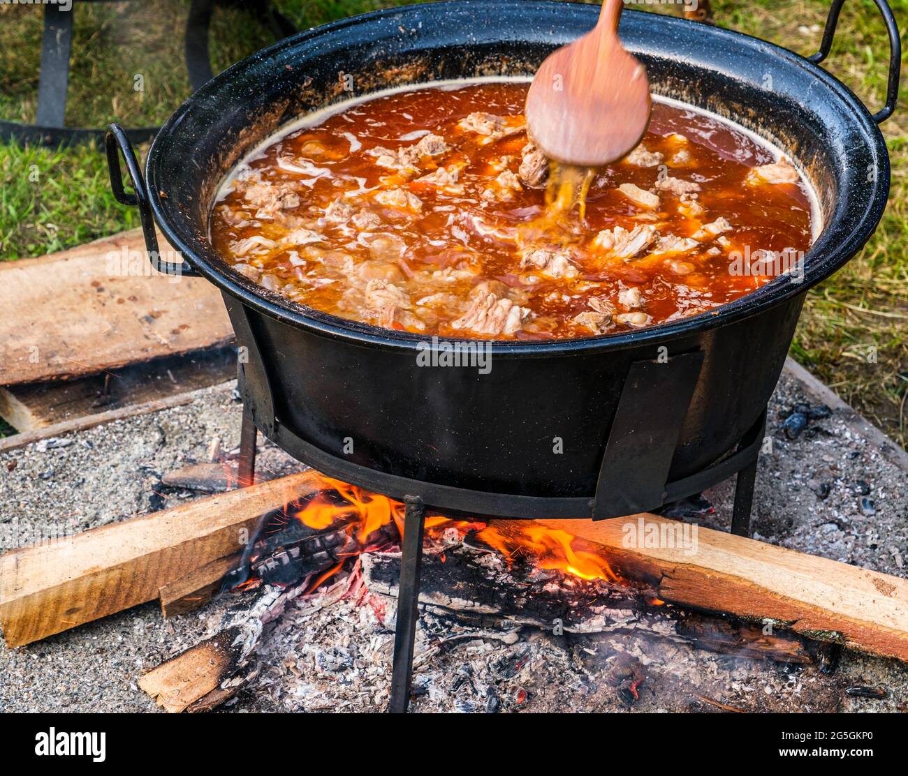 Romanian traditional food prepared at the cauldron on the open fire ...