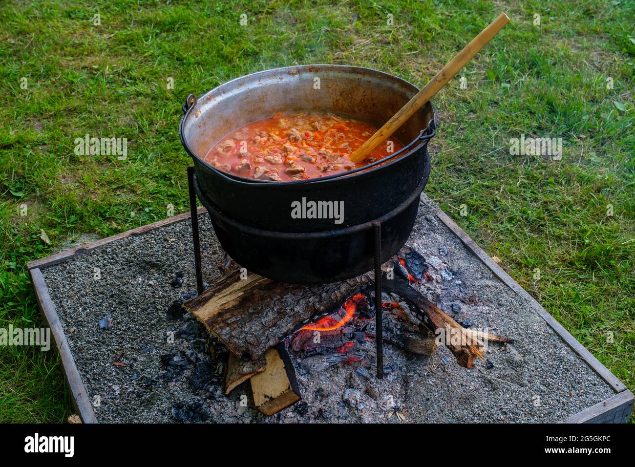 Romanian traditional food prepared at the cauldron on the open fire ...