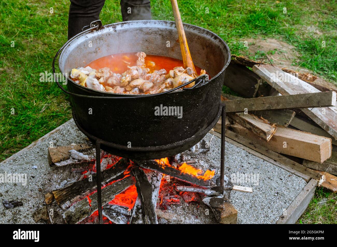 Romanian traditional food prepared at the cauldron on the open fire ...