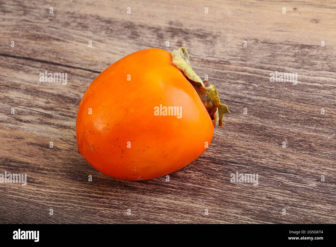 Ripe sweet and tasty persimmon fruit Stock Photo - Alamy