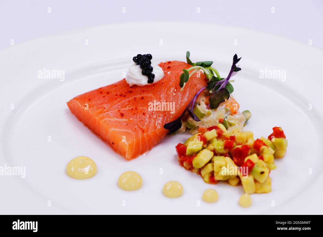 mei cook salmon dish with caviar, luxury fine dining food Stock Photo ...