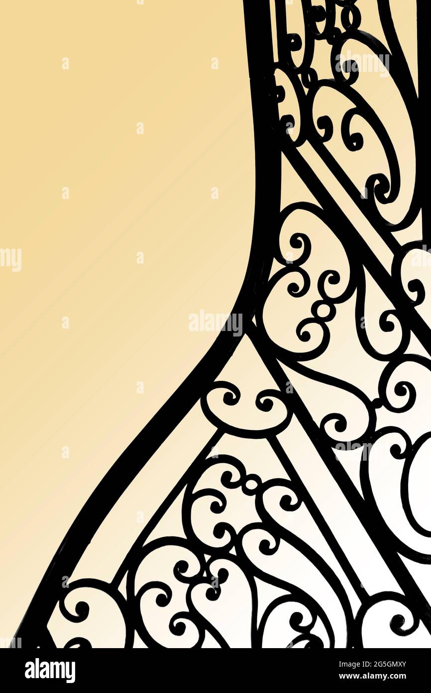 Close up of a classic wrought iron stair railing inside a French ...