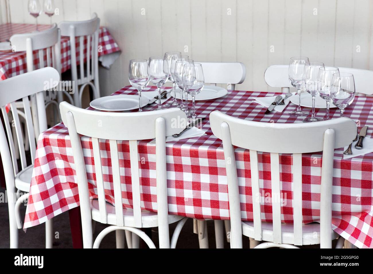Vintage table set in a French bistro Stock Photo - Alamy