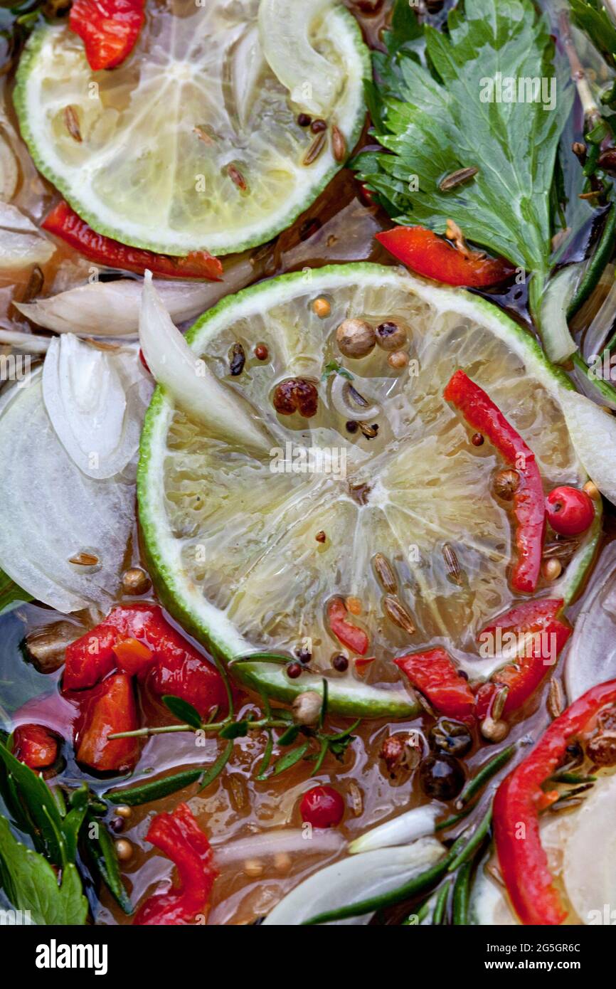 Ingredients and spices in a French marinade Stock Photo - Alamy
