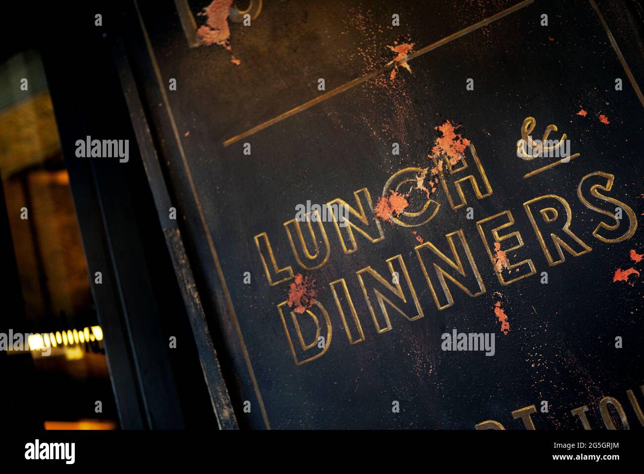 Dirty facade of an old vintage pub Stock Photo - Alamy