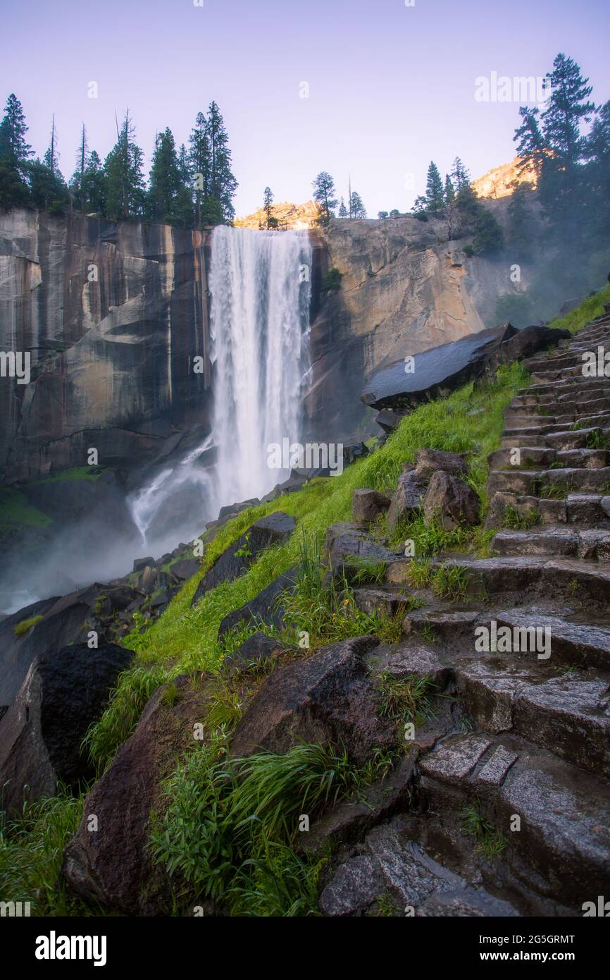 Waterfalls full of mist at Vernal Fall Yosemite. Mist hiking trail with ...