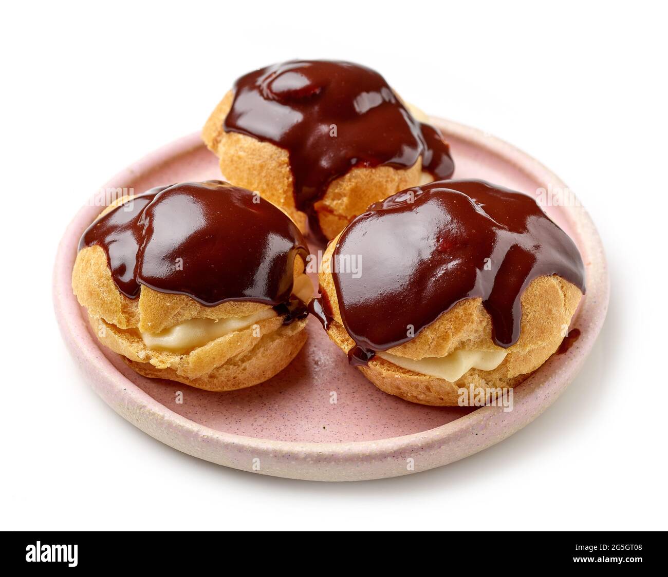 plate of freshly baked cream puffs isolated on white background Stock ...