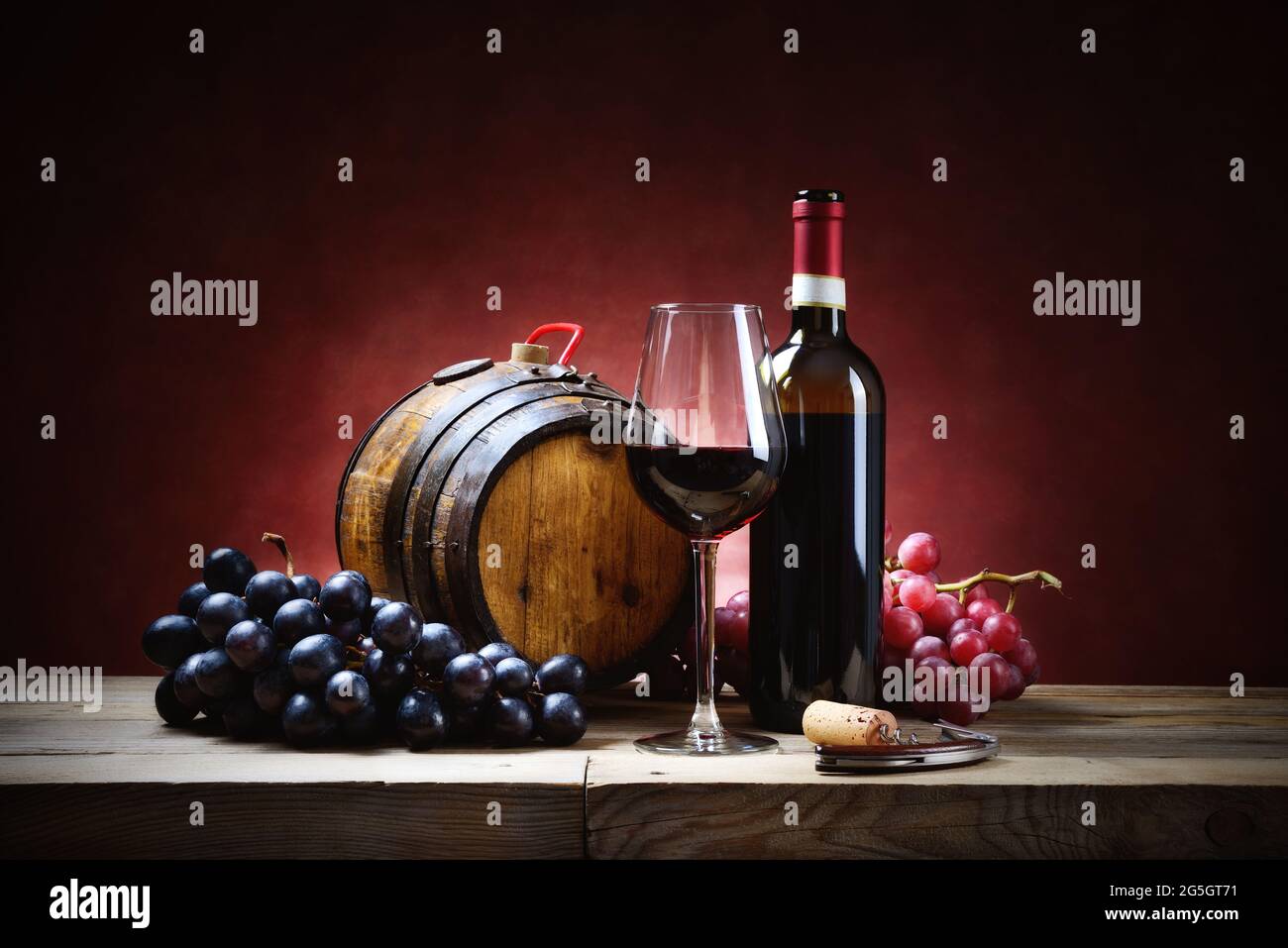 Still life with glass bottle and fruit hi-res stock photography and ...