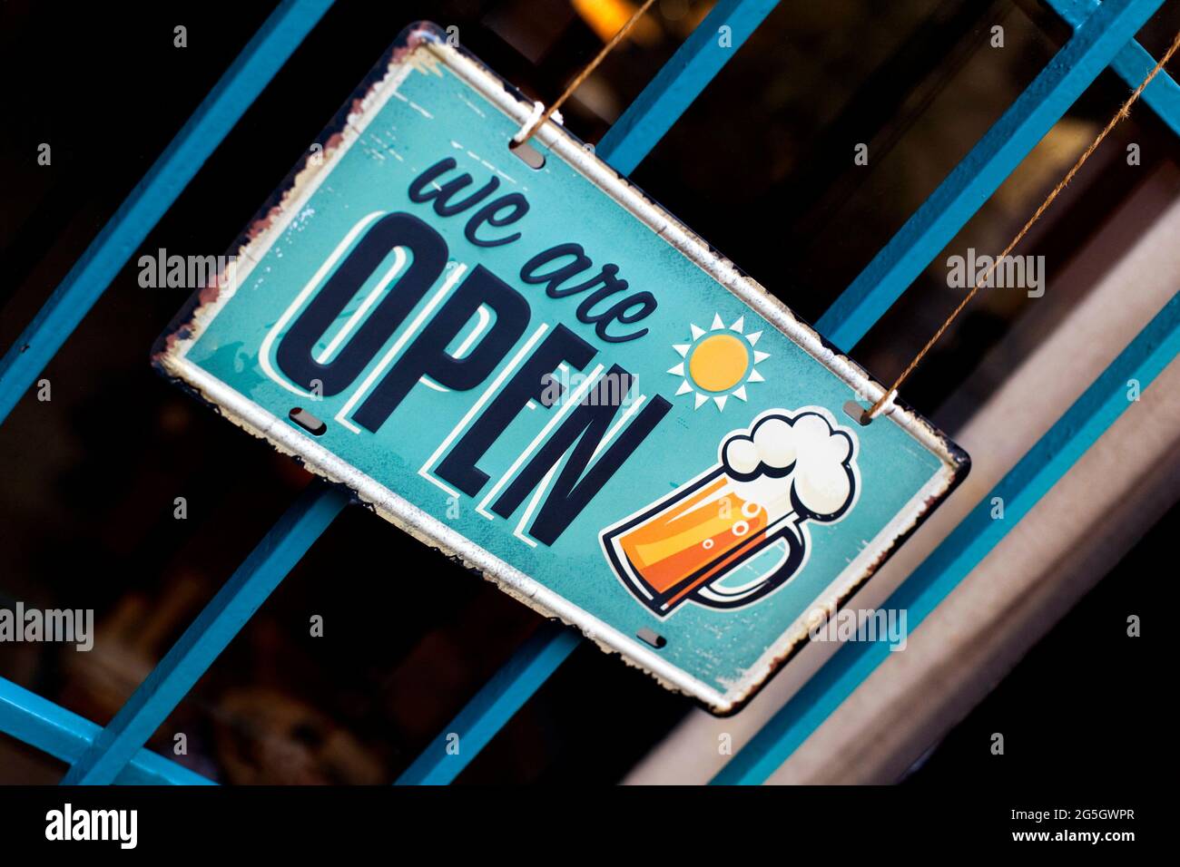 Vintage open sign on a window Stock Photo - Alamy