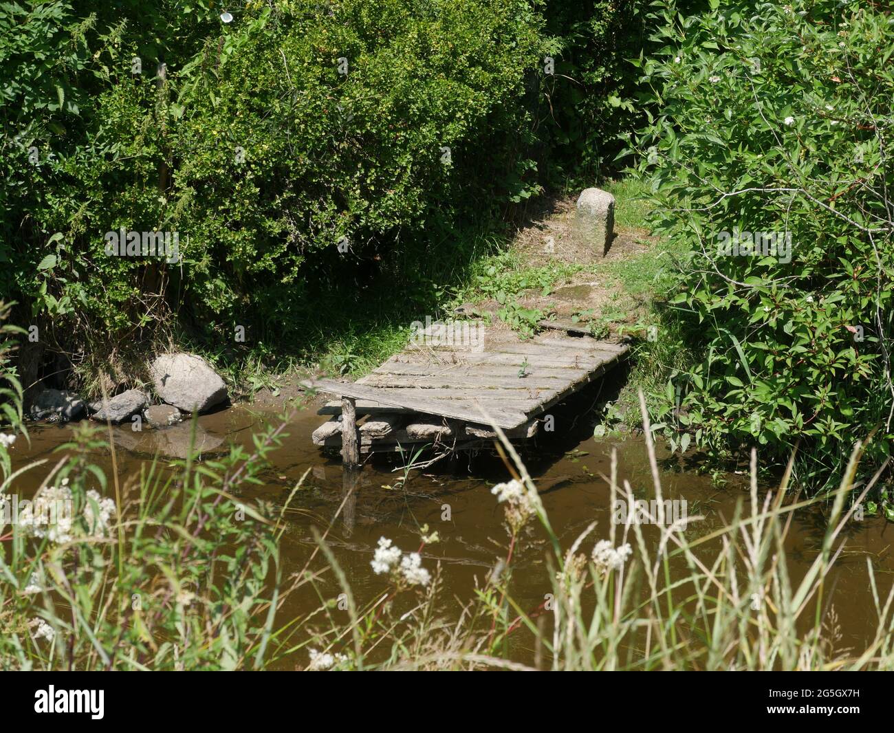Old broken stone bridge summer hi-res stock photography and images - Alamy