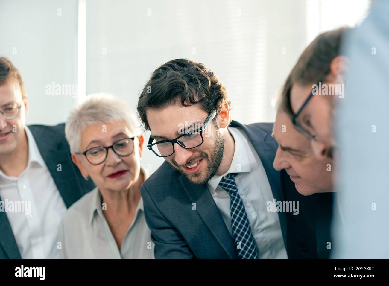 close up. smiling business colleagues discussing new ideas Stock Photo ...