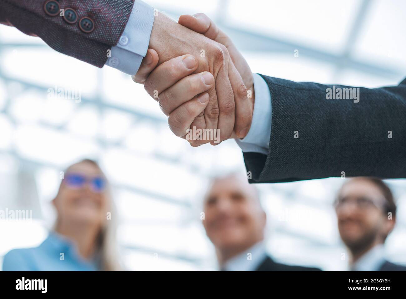 close up. reliable handshake of business people Stock Photo - Alamy